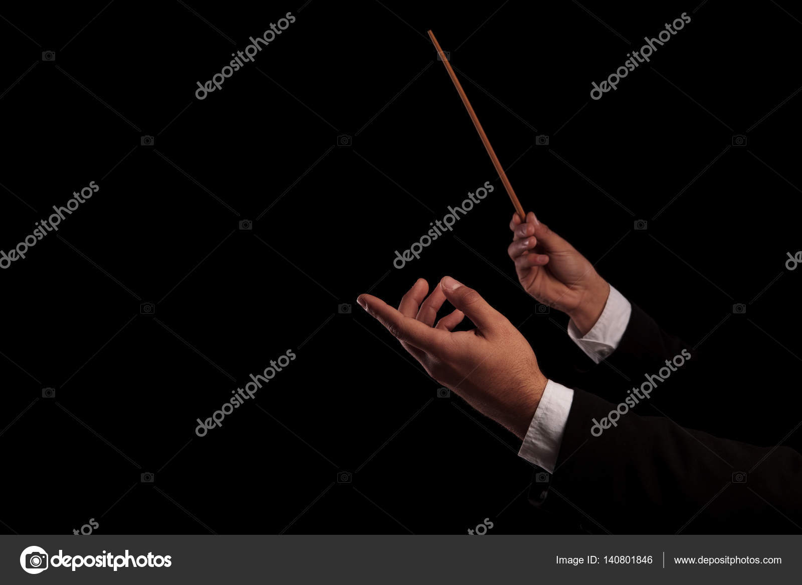 Conductor conducting an orchestra Stock Photo by ©feedough 140801846