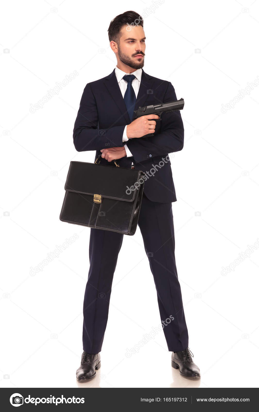 Young modern hitman showing his gun — Stock Photo © feedough #165197312