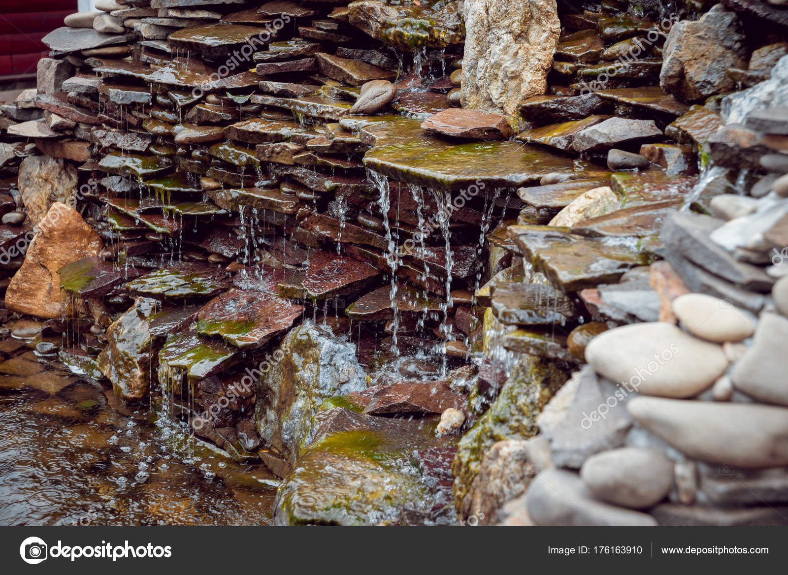 Mini Waterfall Fountain Restaurant Stock Photo by ©Romaset 176163910