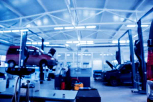 Auto Repair Service Blurred Background Stock Photo by ©Romaset 204816522