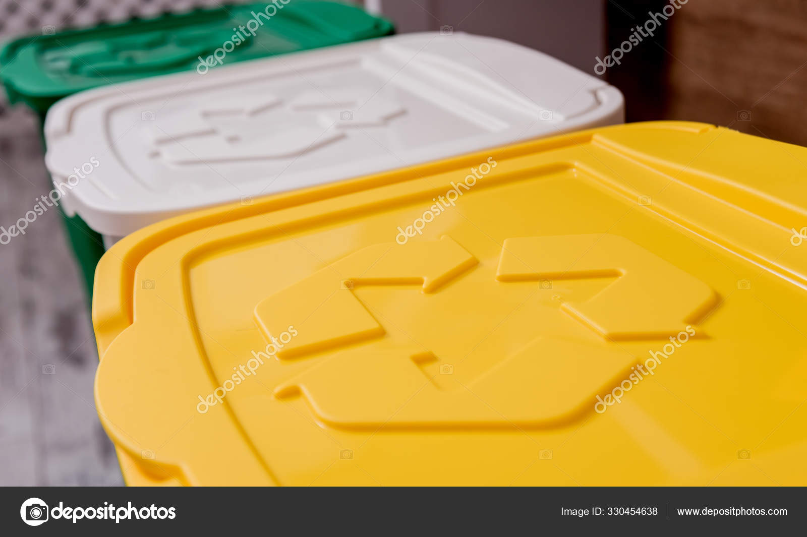 Recycle bins in the kitchen. Household waste sorting. Environmentally ...