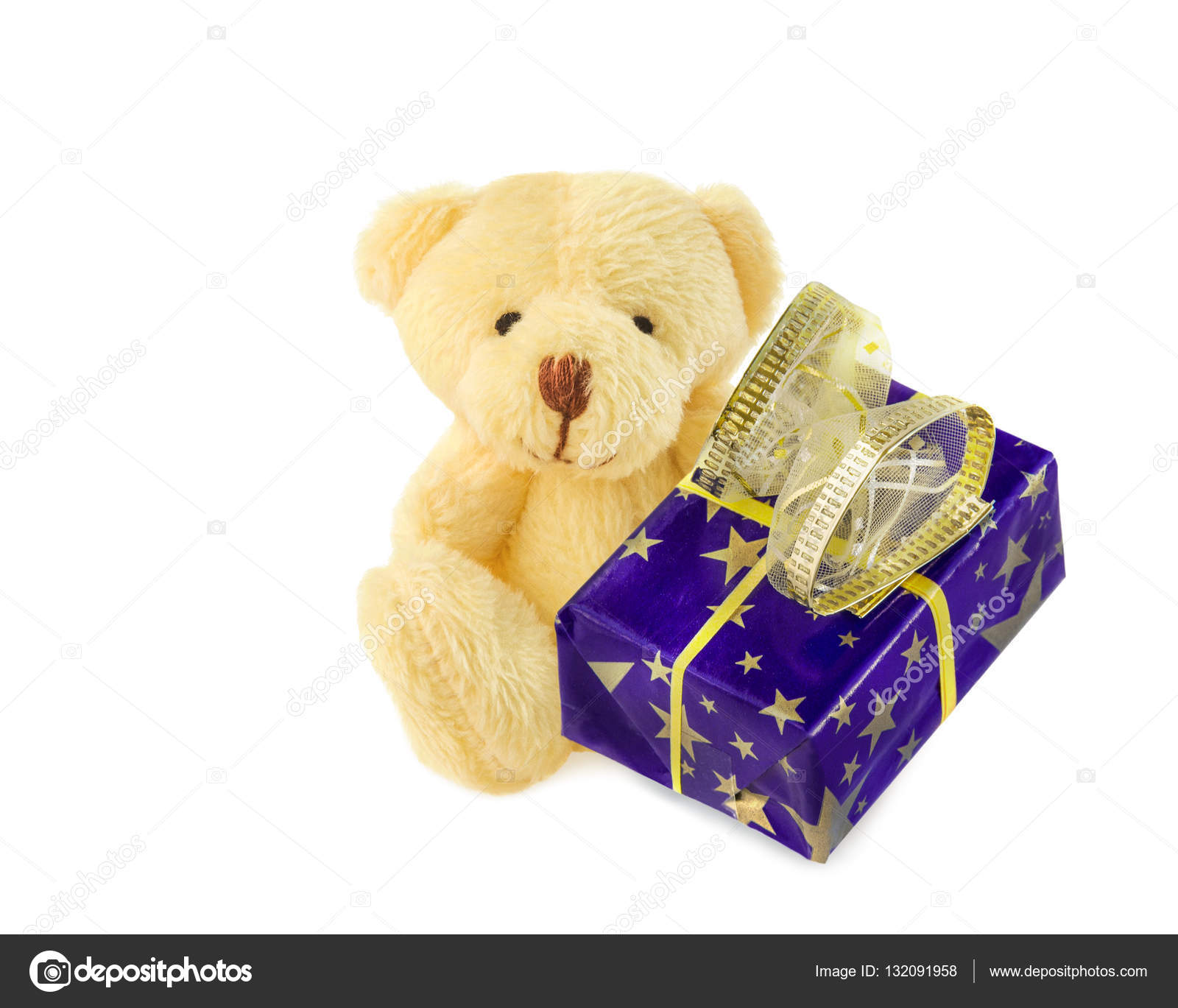 Classic teddy bear sitting with blue gift box on white. Stock Photo by ...