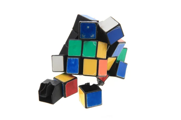 Cube of rubik puzzle. Broken – Stock Editorial Photo © namsilat #1097794