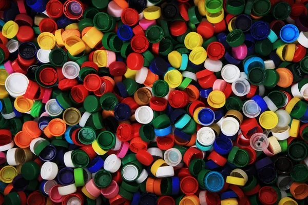 Plastic bottle caps Stock Photo by ©pavsie 56736609