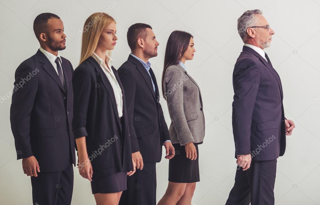 Beautiful business team Stock Photo by ©GeorgeRudy 128009368