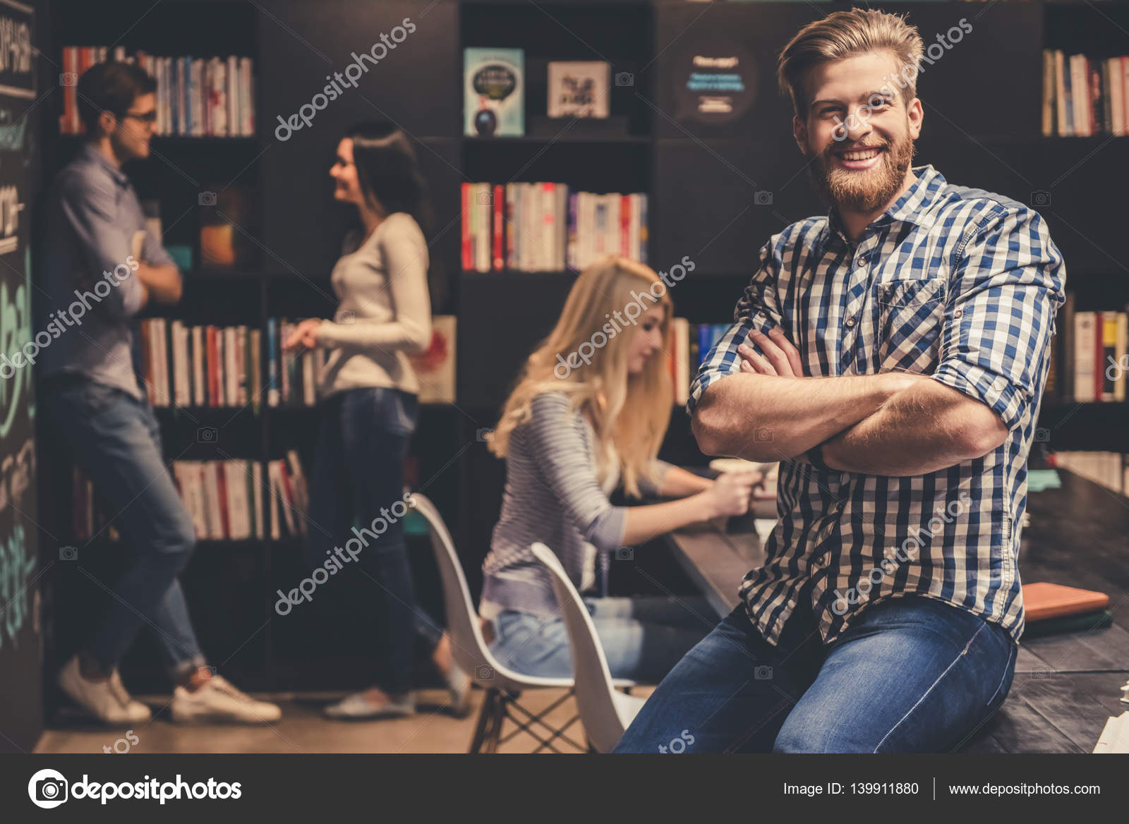 Young people in the library Stock Photo by ©GeorgeRudy 139911880