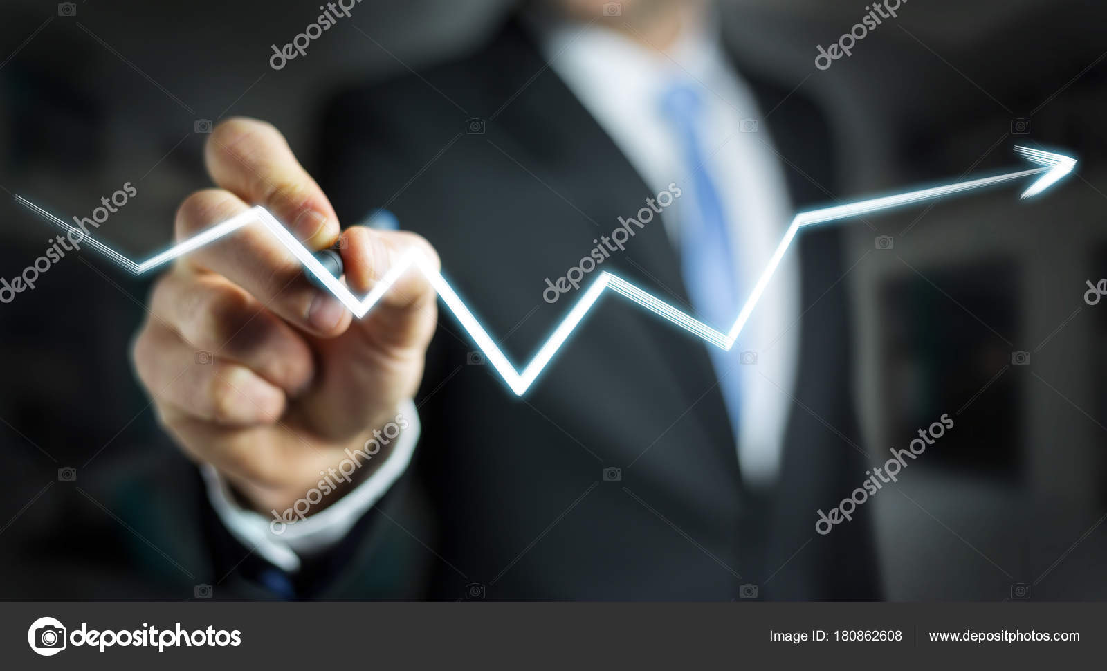 Businessman drawing hand-drawn arrow going up Stock Photo by ©sdecoret ...