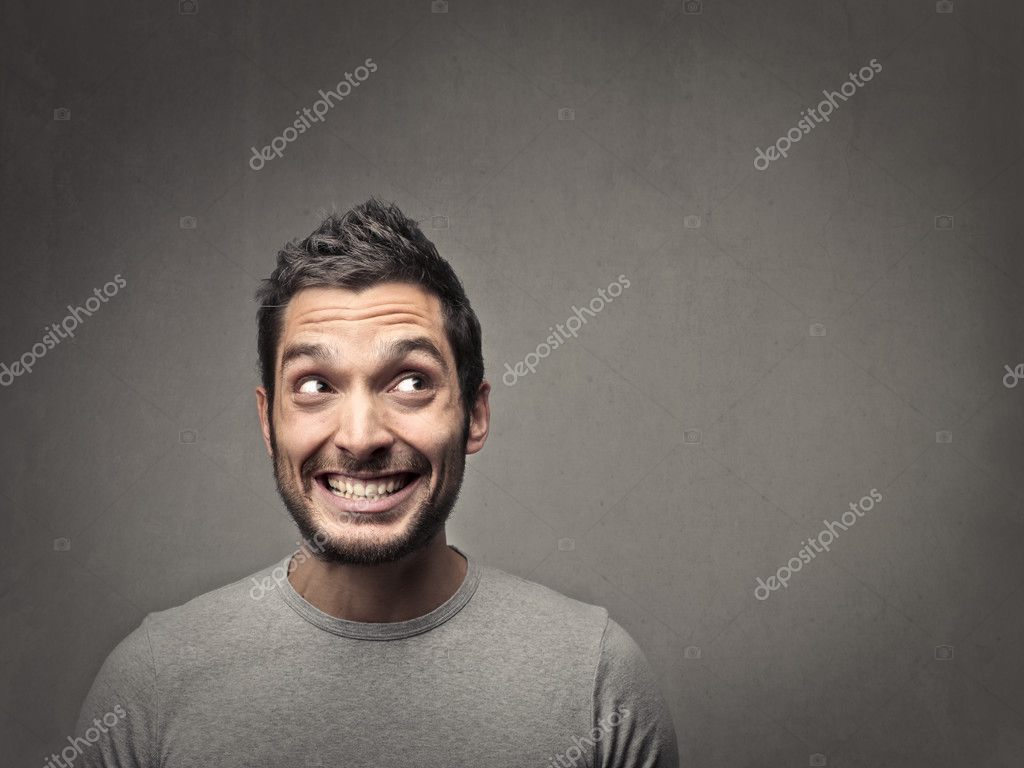 Man with a forced smile Stock Photo by ©olly18 126021054