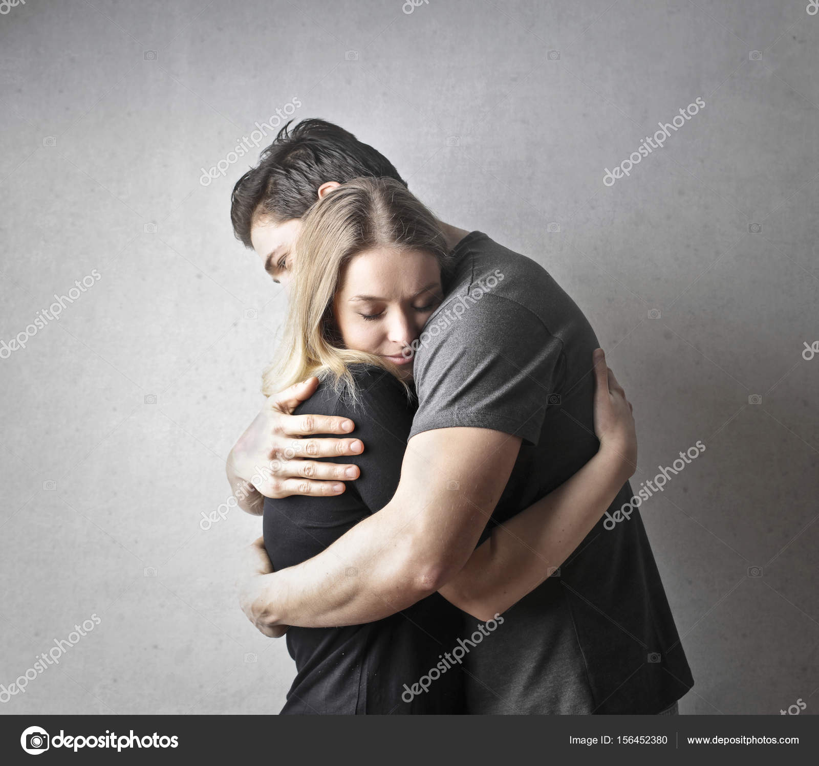 Young couple hugging each other — Stock Photo © olly18 #156452380