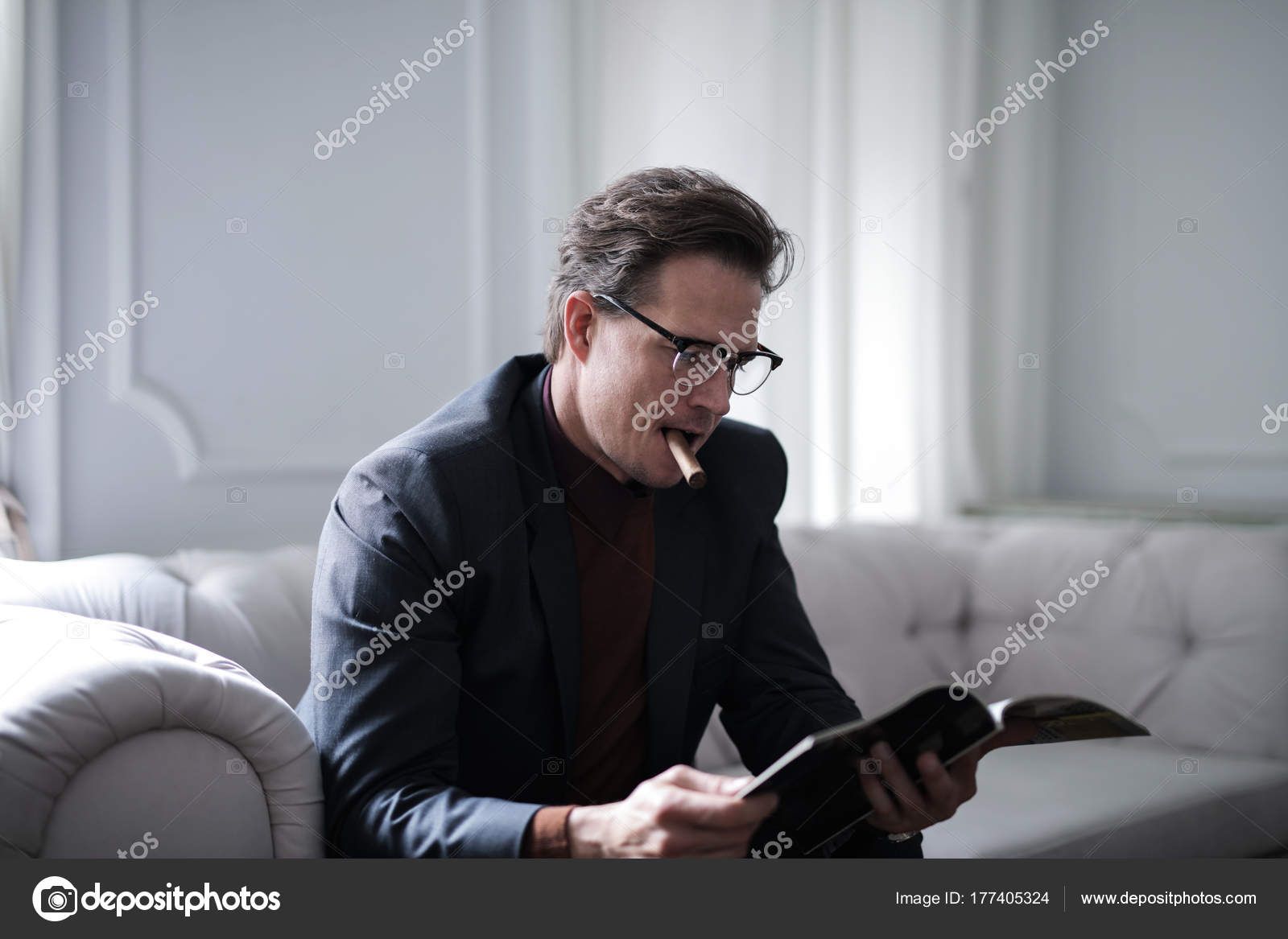 Man Reading A Magazine