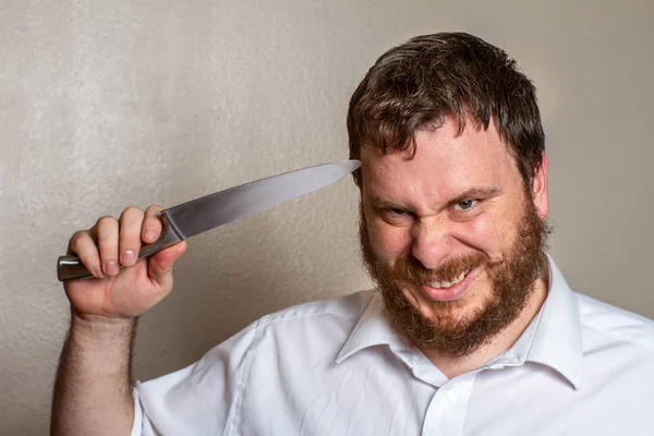 Angry man with a knife Stock Photo by ©kozzi2 20322529