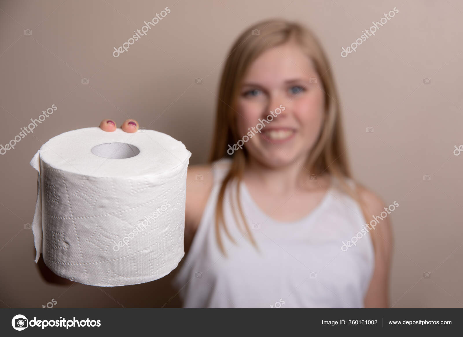 Young girl holding out a roll of toilet paper Stock Photo by ©txking ...