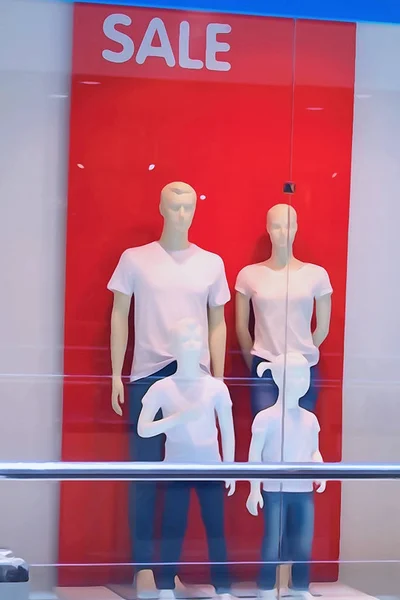 Four dummies in a clothing store Stock Photo by ©ra3rn_ 190507676