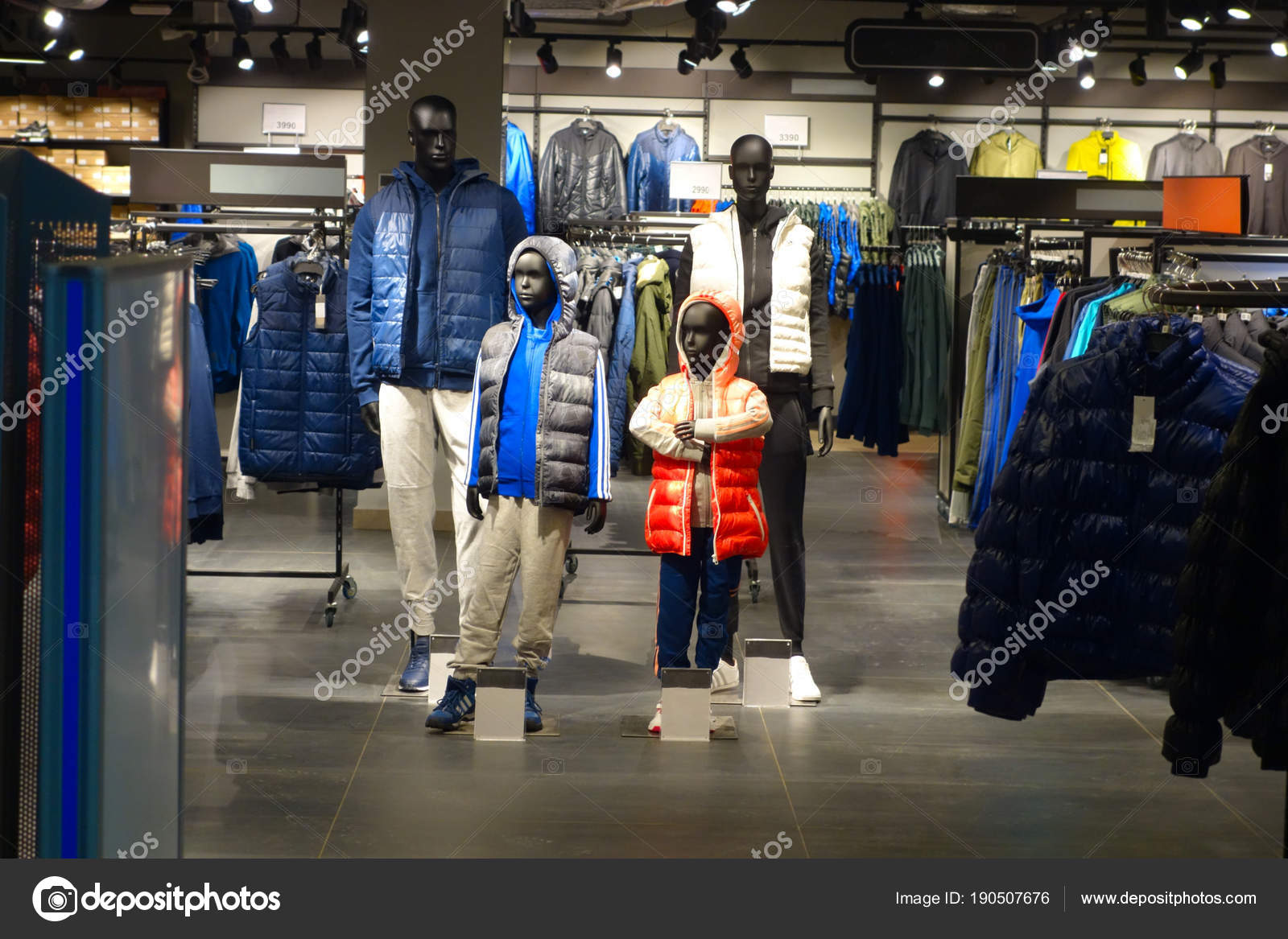 Four dummies in a clothing store Stock Photo by ©ra3rn_ 190507676
