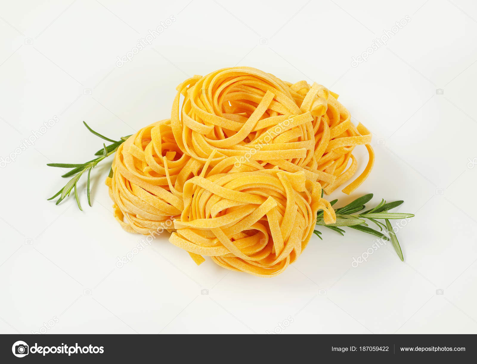 Dried ribbon pasta — Stock Photo © ajafoto #187059422