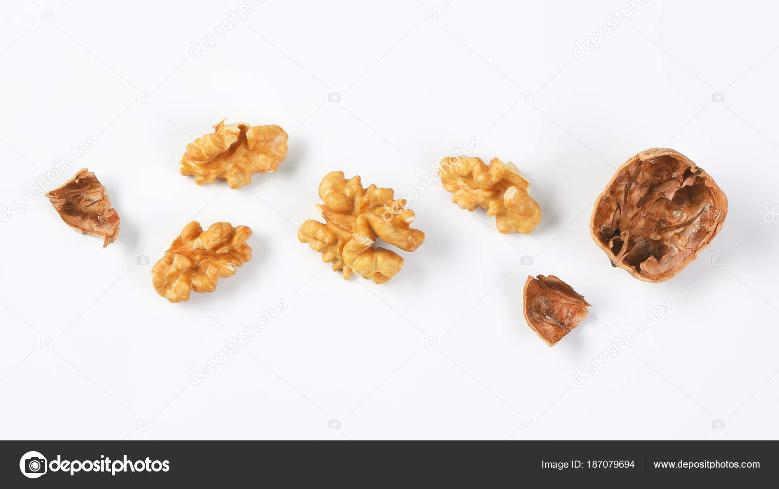 Walnut kernels and shells Stock Photo by ©ajafoto 187079694