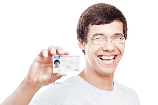 Guy with driving license Stock Photo by ©furtaev 98501486