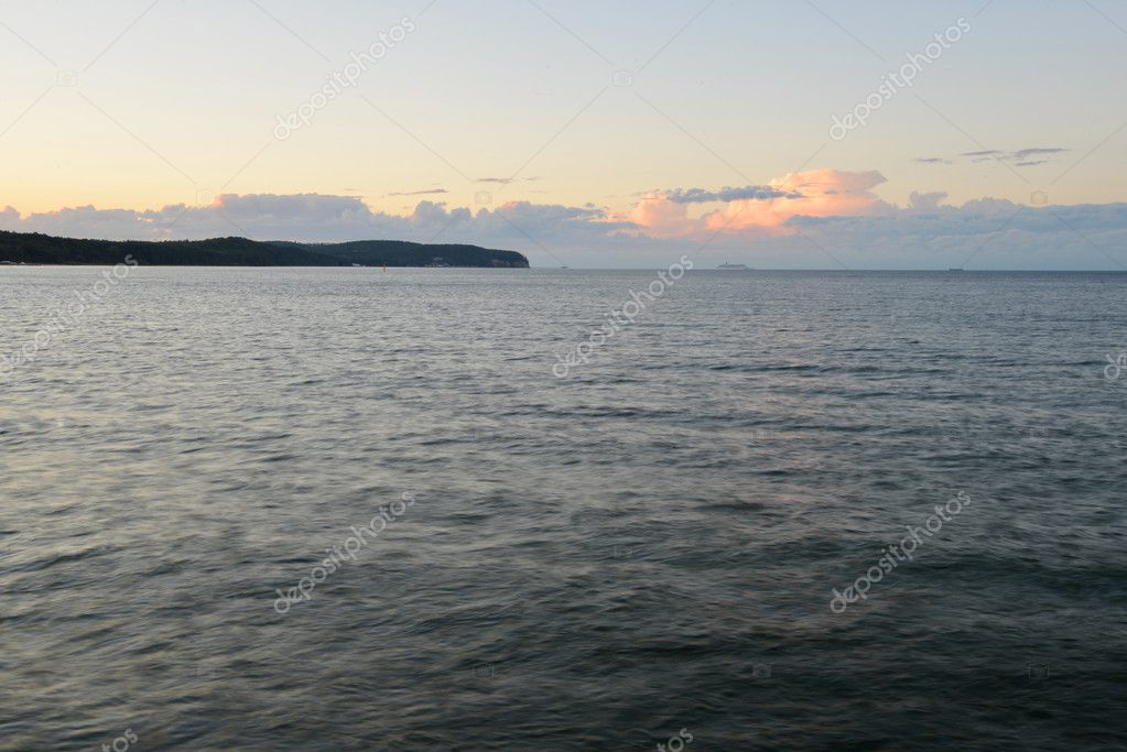 Beautiful sunset at shore sea — Stock Photo © Taden1 #125658024