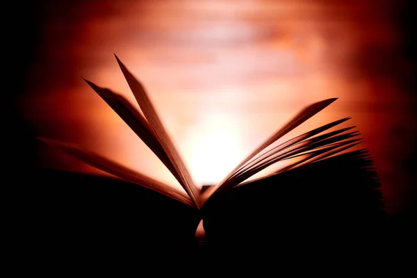 Glowing light from book open hands Stock Photos, Royalty Free Glowing ...