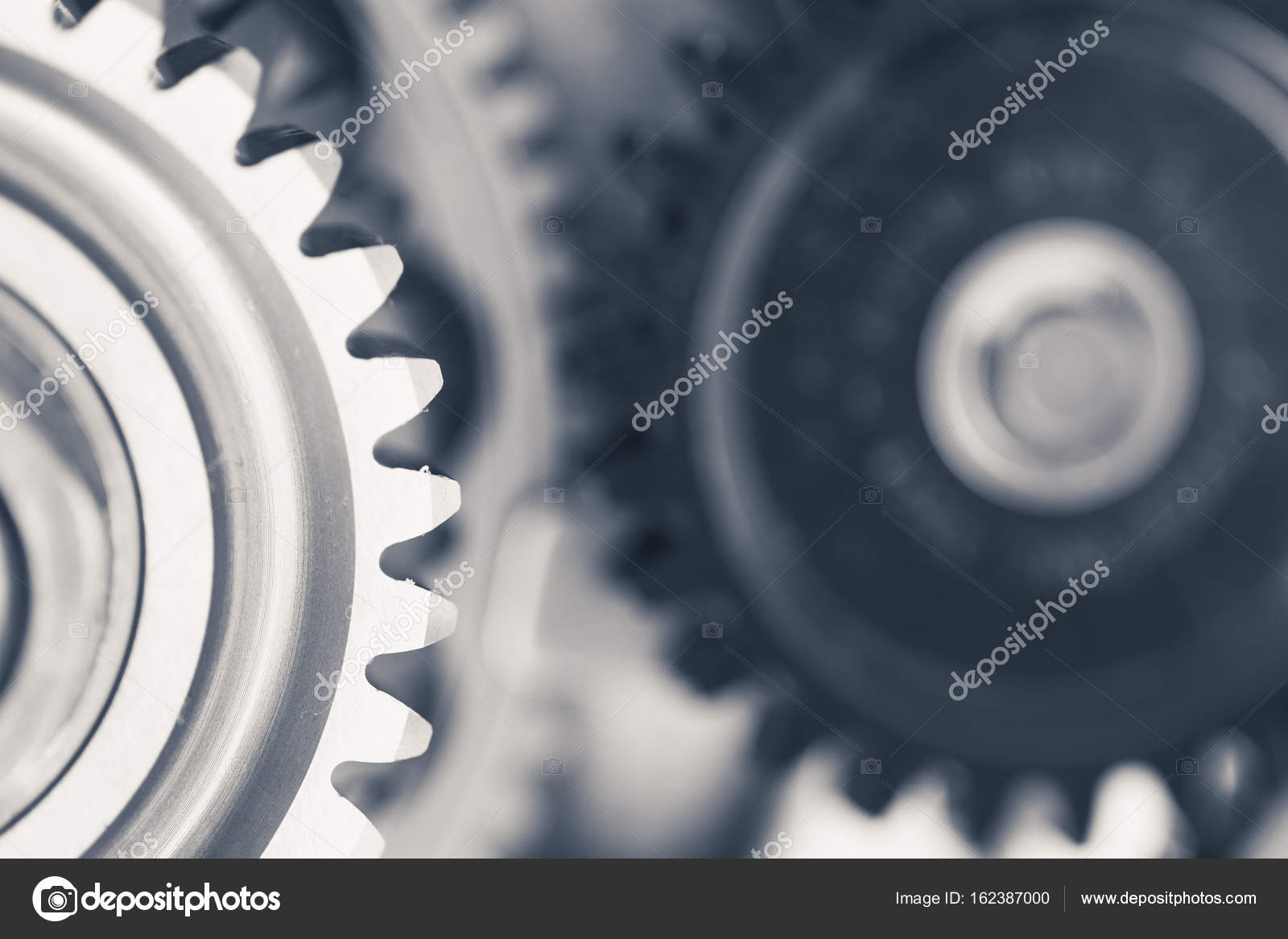 Engine gear wheels, industrial background Stock Photo by ©nikkytok ...