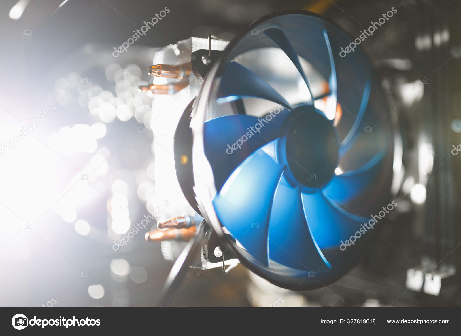 Blue cpu cooler inside PC case, shiny light background Stock Photo by ...
