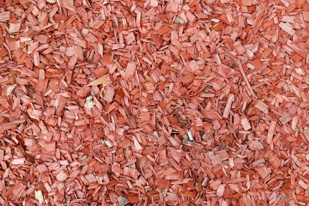 Aserrín de pino y adornos están impregnados con un antiséptico rojo 2022