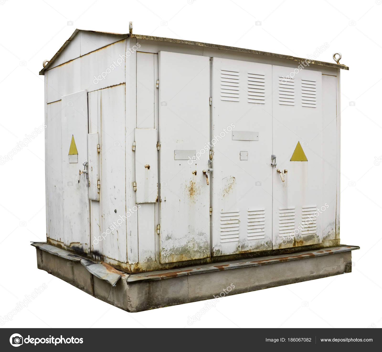 Small aged rusty rural power electric substation stands on the — Stock ...