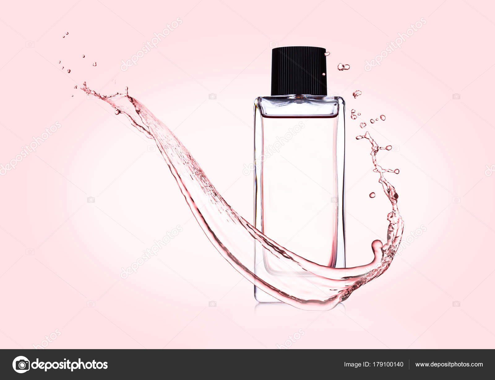 Luxury pink liquid perfume bottle with splashes Stock Photo by ...