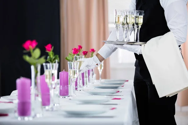 Waiter Serving Banquet Table — Stock Photo © AndreyPopov #138899856