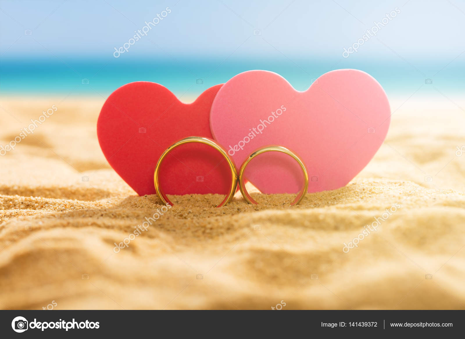 Two Hearts With Rings Stock Photo by ©AndreyPopov 141439372