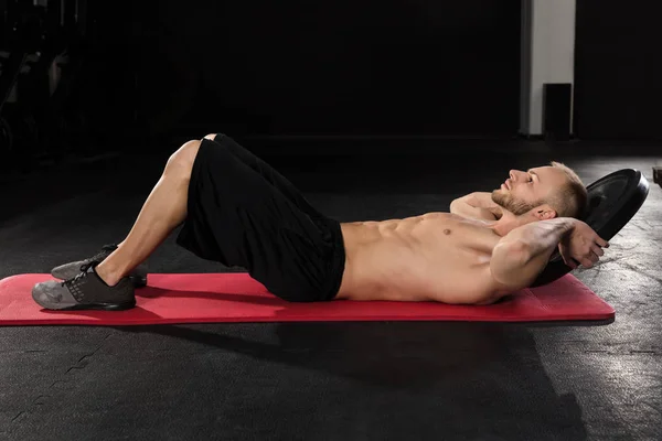 Confident athlete doing crunches Stock Photos, Royalty Free Confident ...