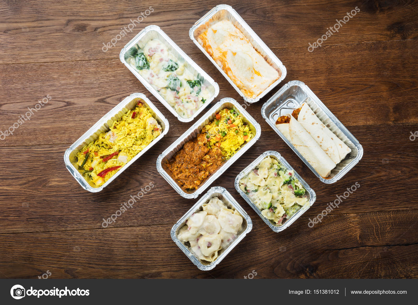 Tasty Meals In Foil Containers — Stock Photo © AndreyPopov #151381012