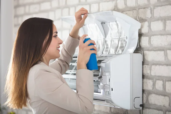 Woman Cleaning Conditioner - Stock Image - Everypixel