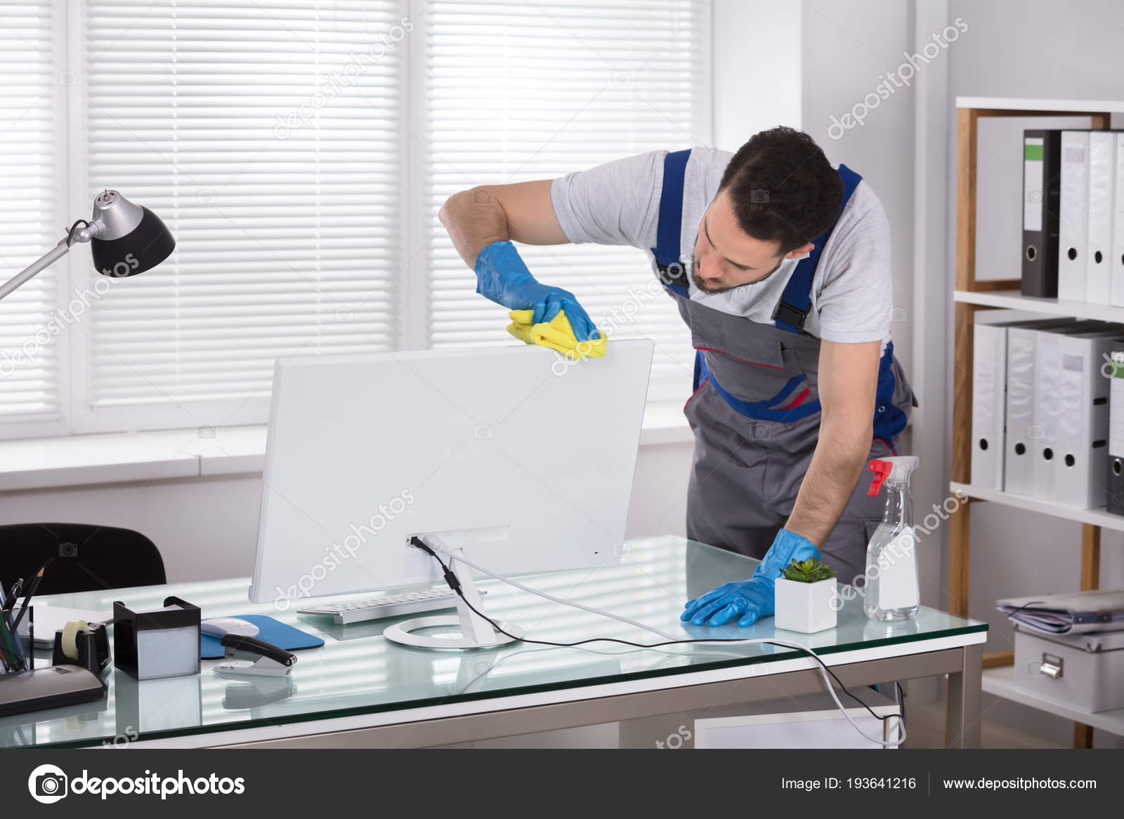 Young Male Janitor Cleaning Computer Sponge Office — Stock Photo ...