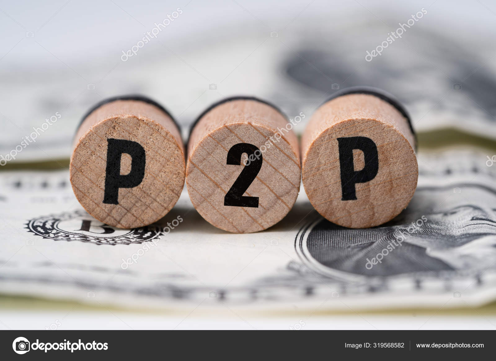 Close P2P Word Wooden Blocks Dollar Bill Stock Photo by ©AndreyPopov 319568582