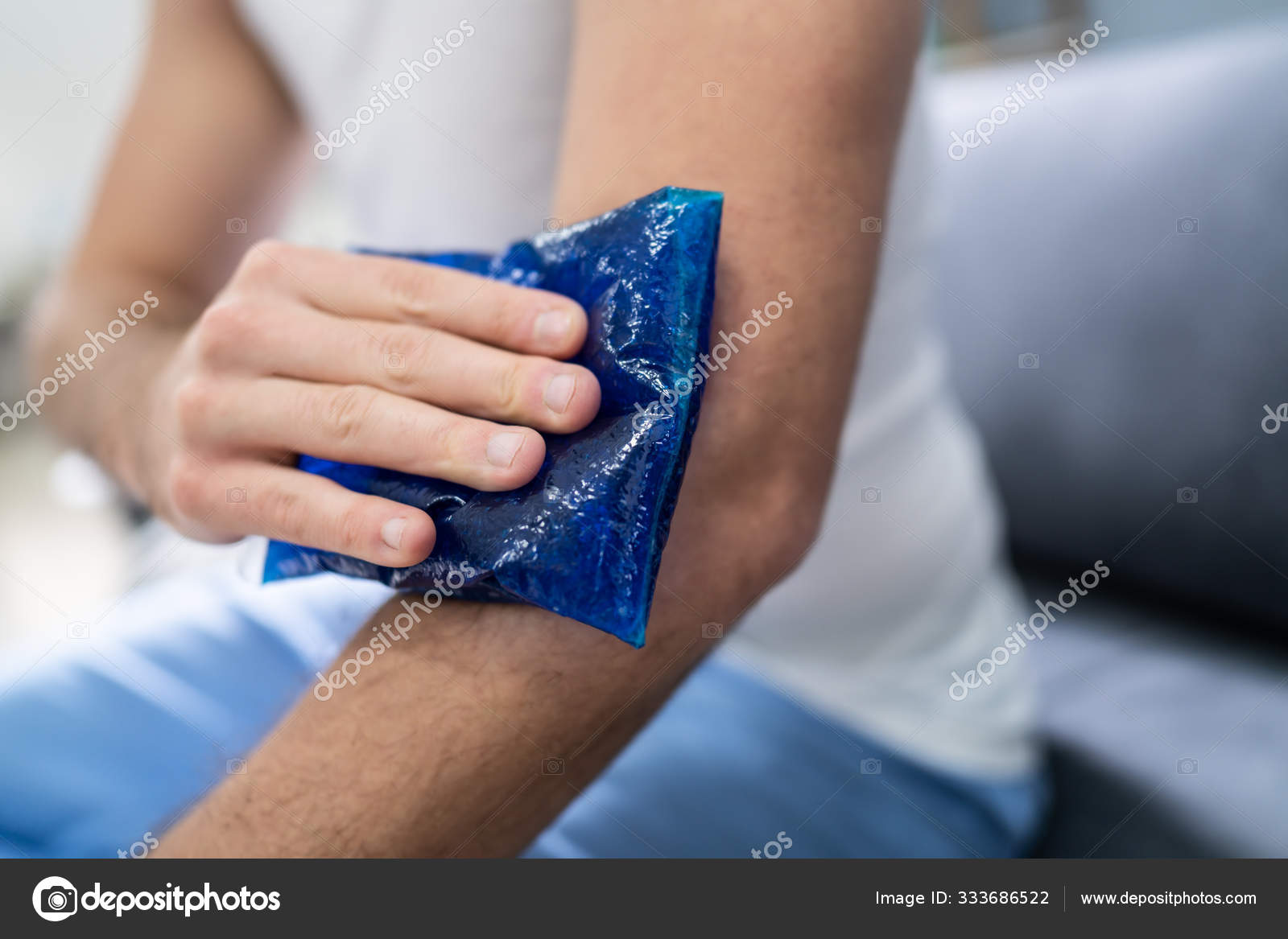 Close Man's Hand Using Ice Gel Pack Arm — Stock Photo © AndreyPopov ...