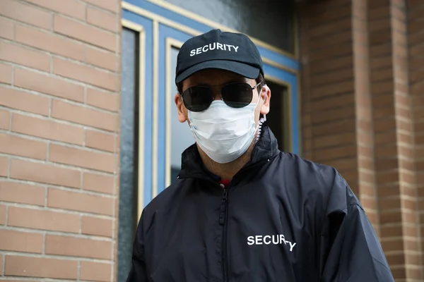 Security Guard Standing Face Mask Entrance Stock Photo by ©AndreyPopov ...