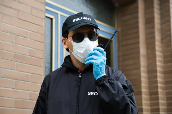 Security Guard Standing Face Mask Entrance Stock Photo by ©AndreyPopov ...
