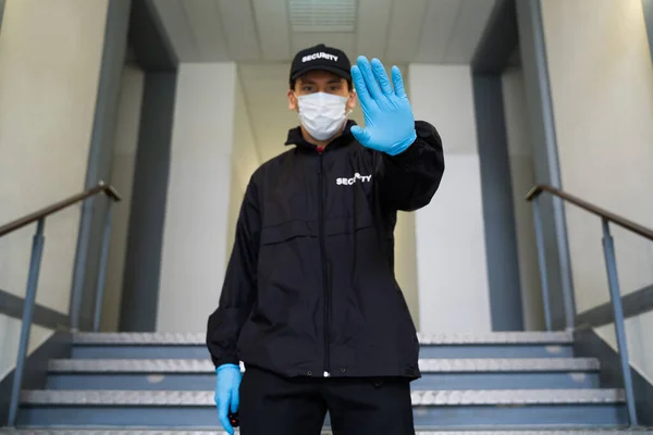 Security Guard Standing Face Mask Entrance Stock Photo by ©AndreyPopov ...