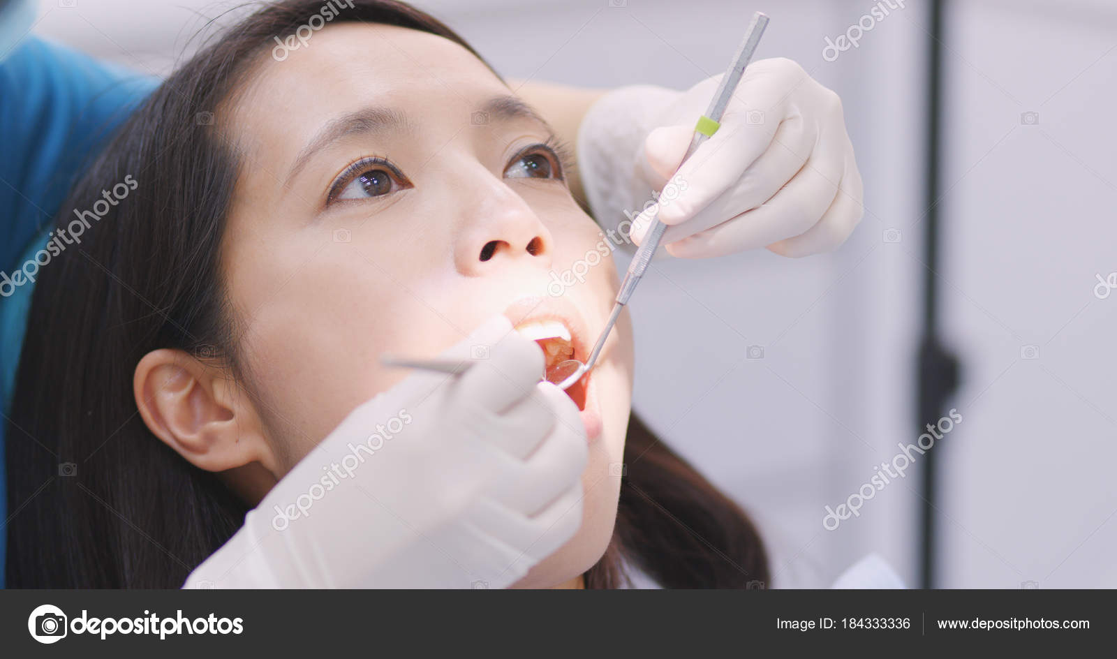 Patient Undergo Check Teeth Stock Photo by ©leungchopan 184333336
