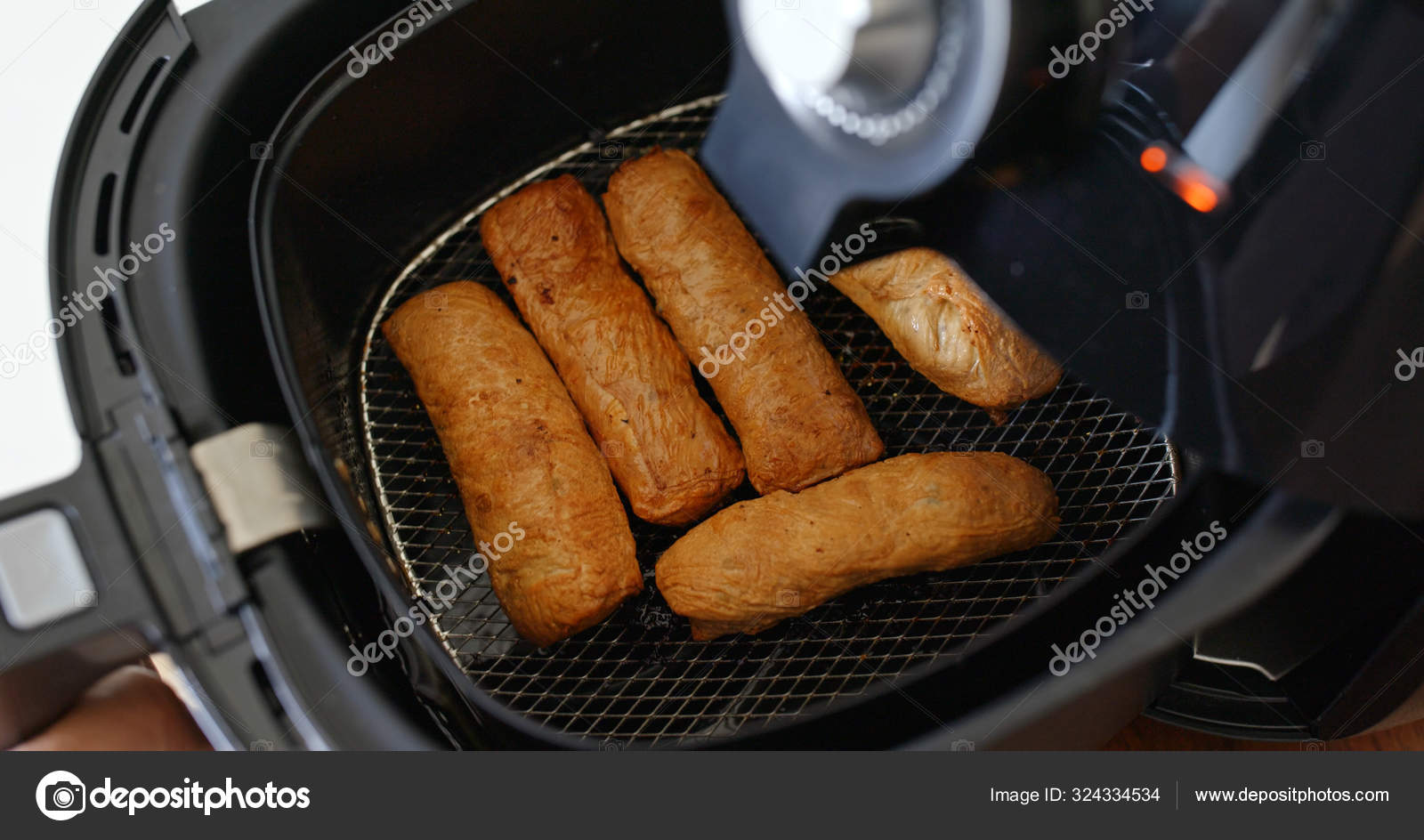 Air fryer homemade crispy fish cake roll Stock Photo by ©leungchopan ...