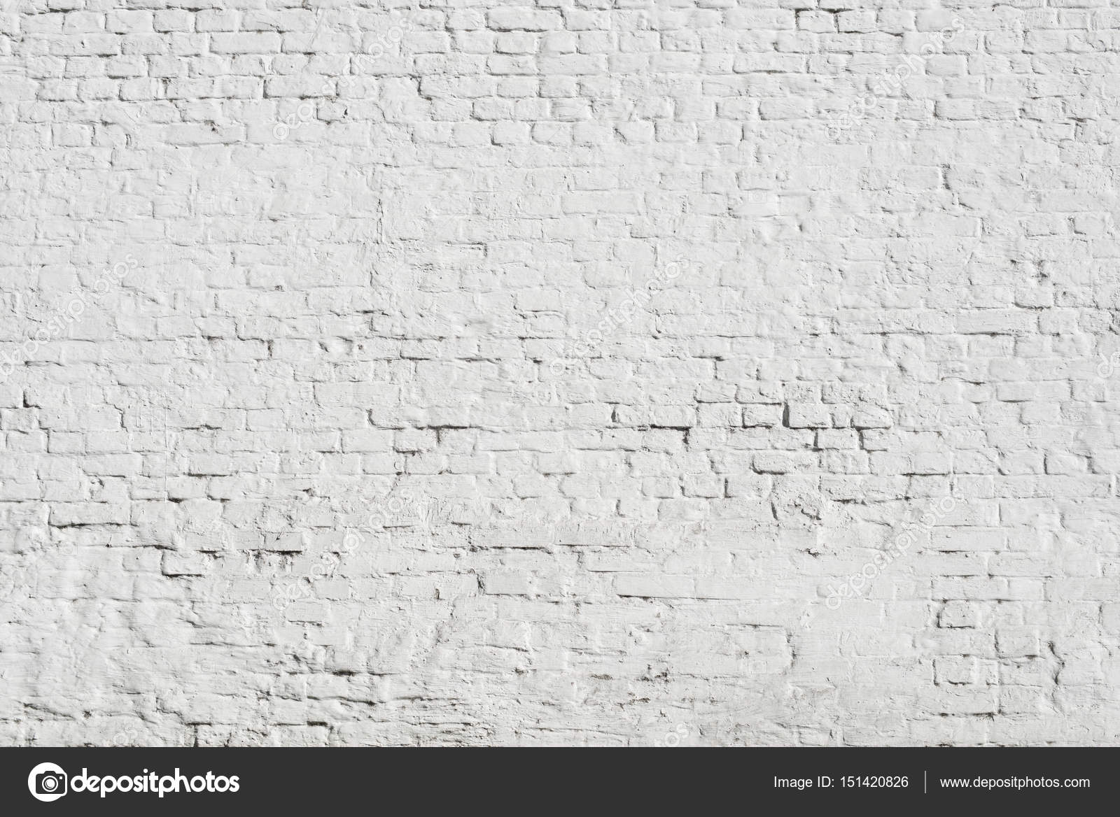 Huge white brick wall Stock Photo by ©yurizap 151420826
