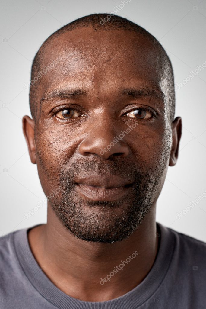 African man with no expression — Stock Photo © Daxiao_Productions ...