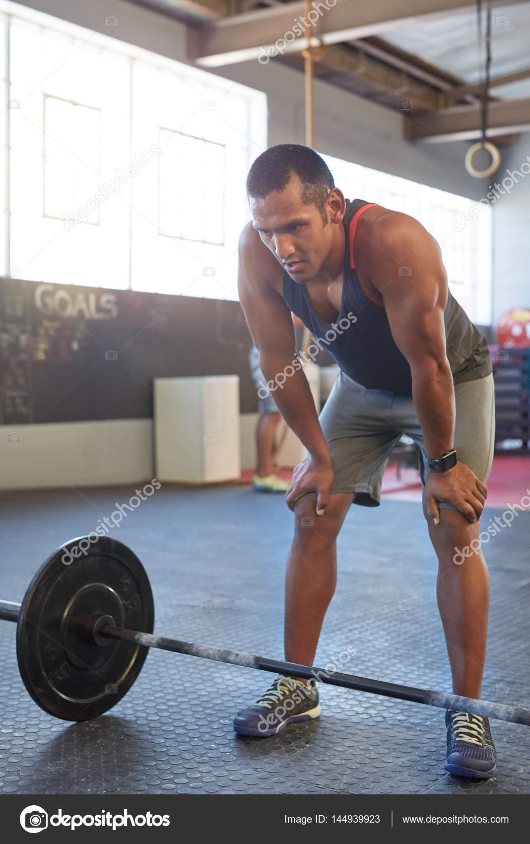 Man resting after weight lifting — Stock Photo © Daxiao_Productions ...