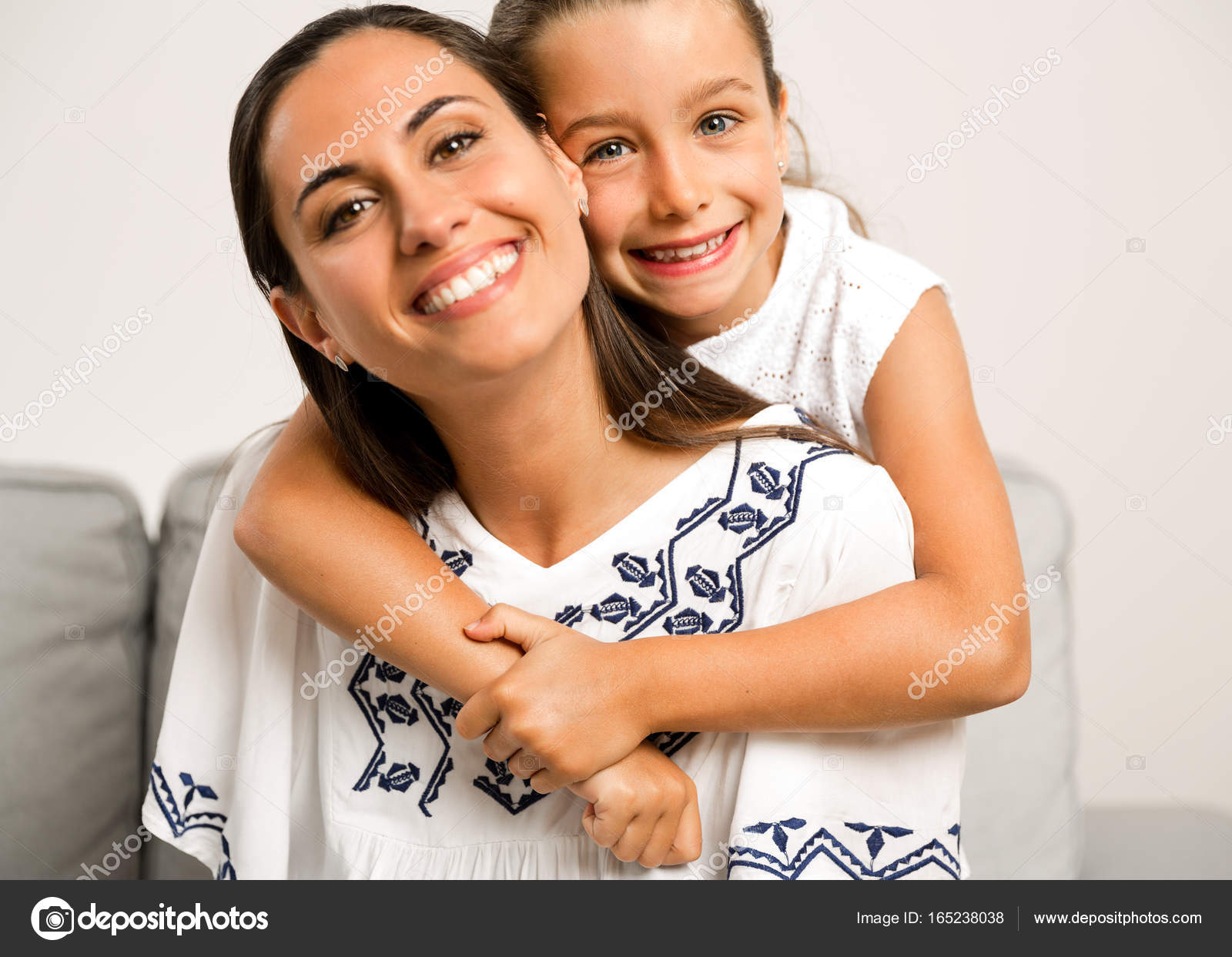 Mother and Daughter smiling Stock Photo by ©ikostudio 165238038 Mother and Daughter smiling Stock Photo by ©ikostudio 165238038
