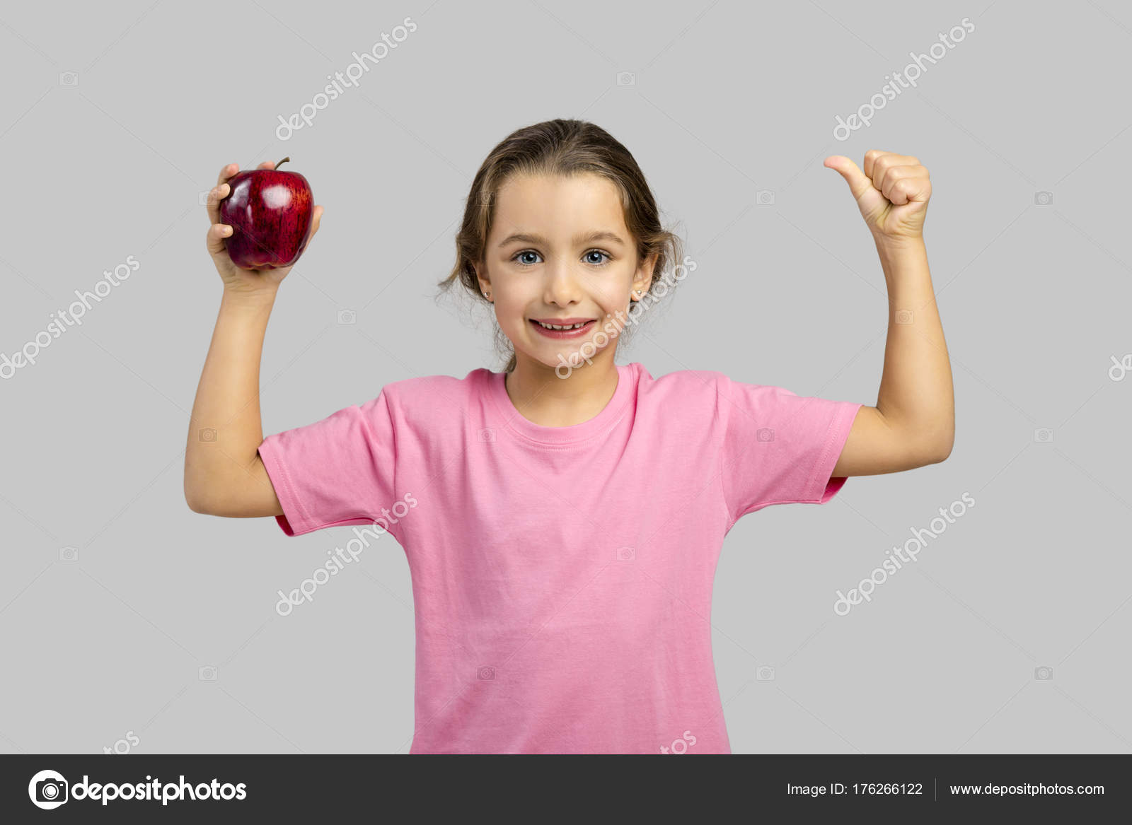 Little girl holding red apple — Stock Photo © ikostudio #176266122 Little girl holding red apple — Stock Photo © ikostudio #176266122