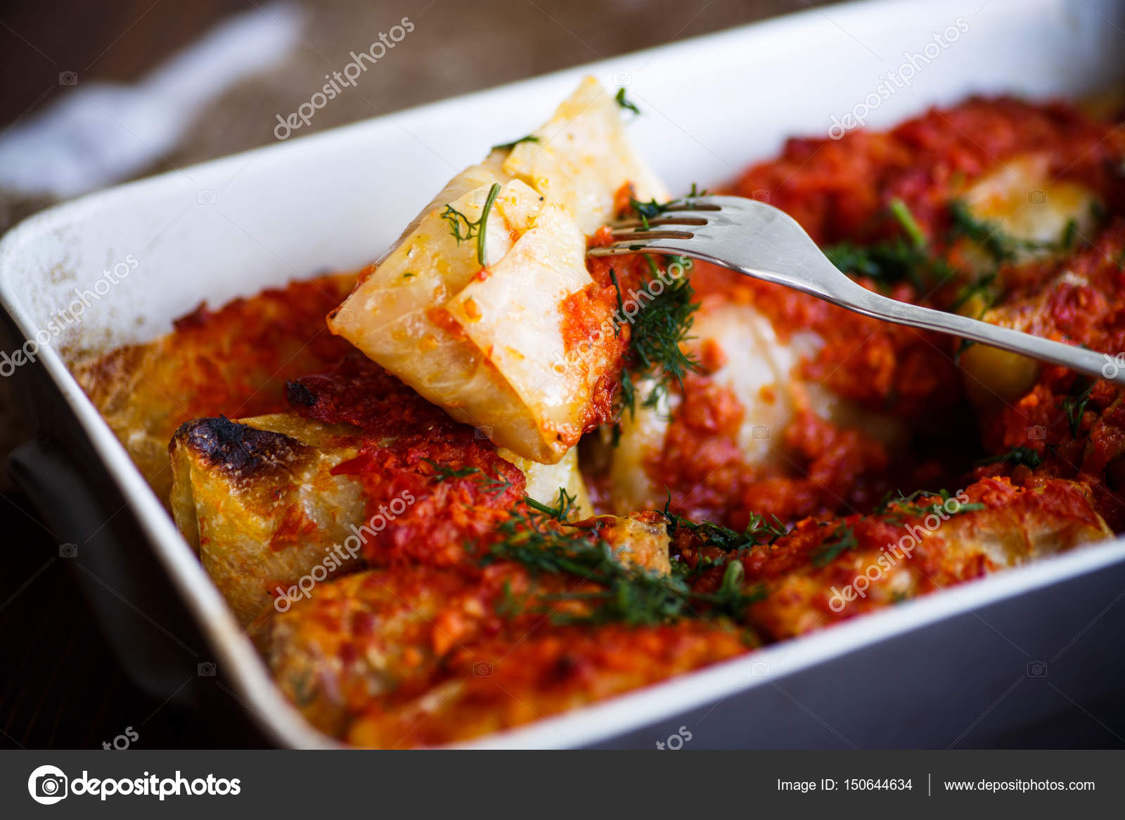 Stuffed cabbage rolls with rice and meat — Stock Photo © Rawlik #150644634