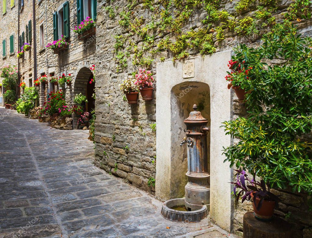 Italian street in small provincial town — Stock Photo © alan64 #129863650