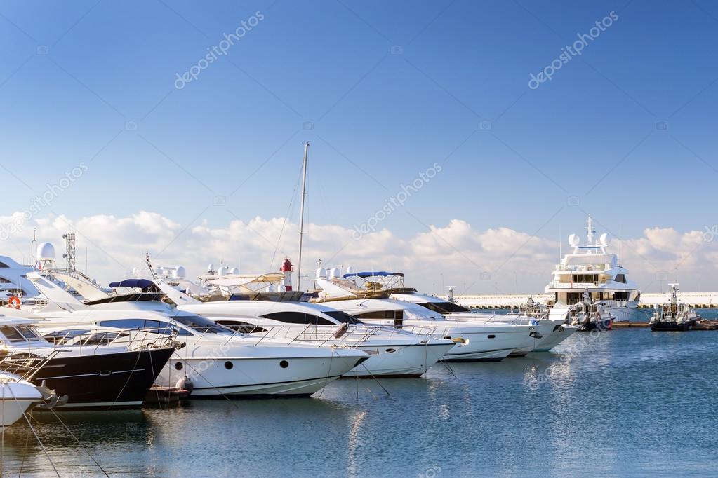 Luxury yacht in Sochi seaport, Russia — Stock Photo © chasdesign #127004140