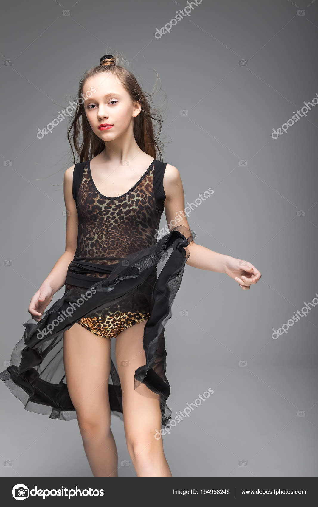 Cute dancer girl Stock Photo by ©luckyphoto 154958246